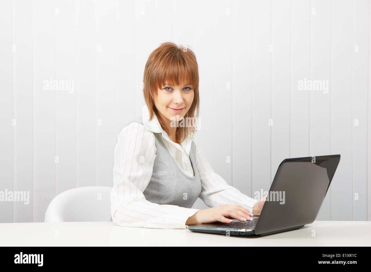 attractive girl with a computer Stock Photo - Alamy