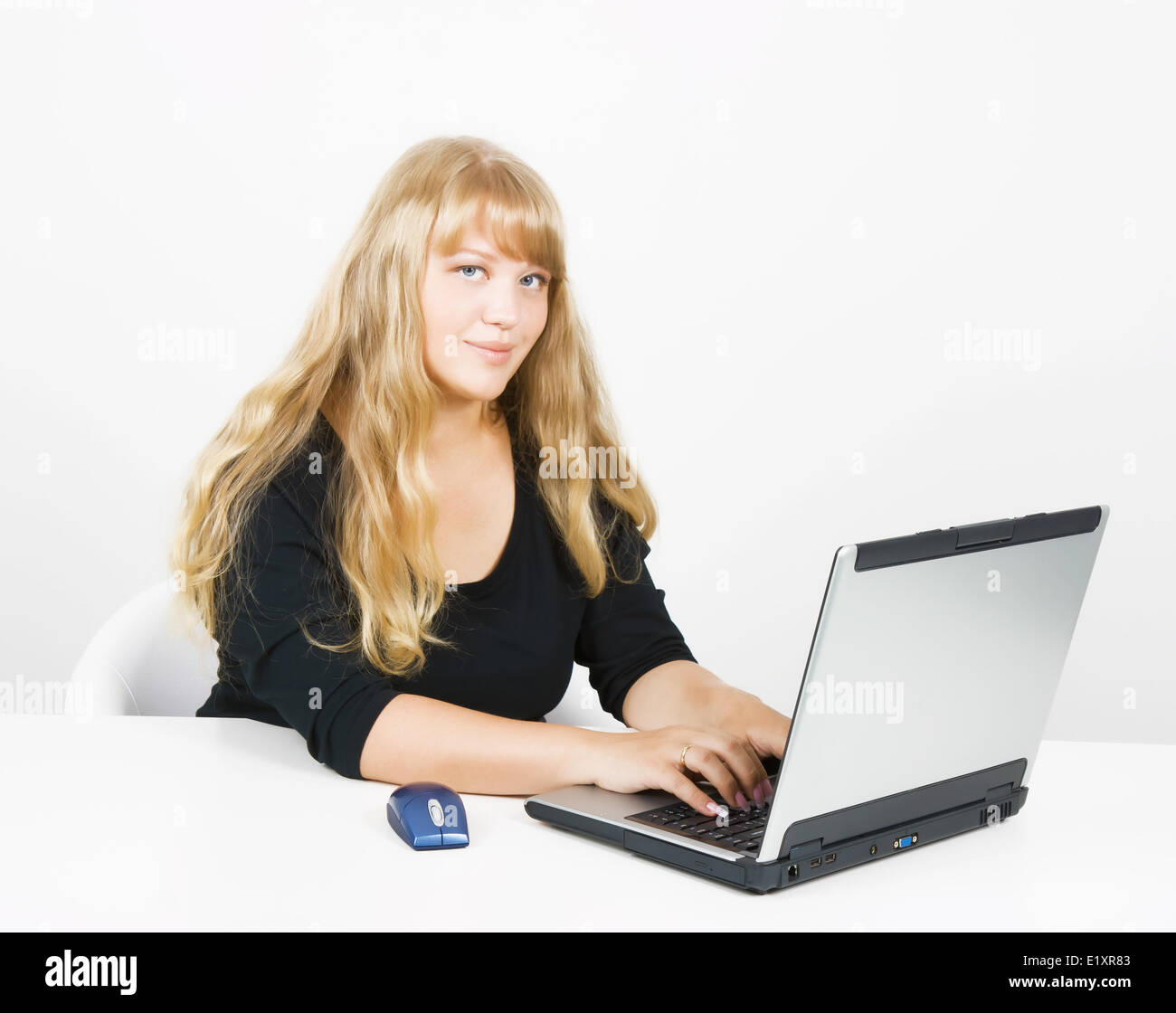 young girl working on laptop Stock Photo - Alamy