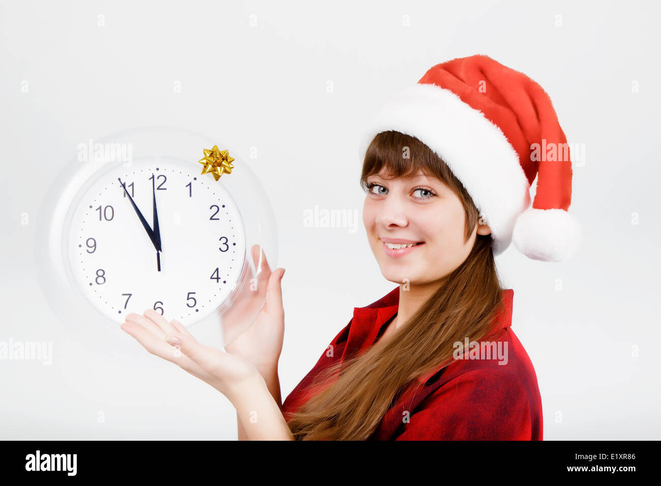 attractive girl with a clock Stock Photo - Alamy