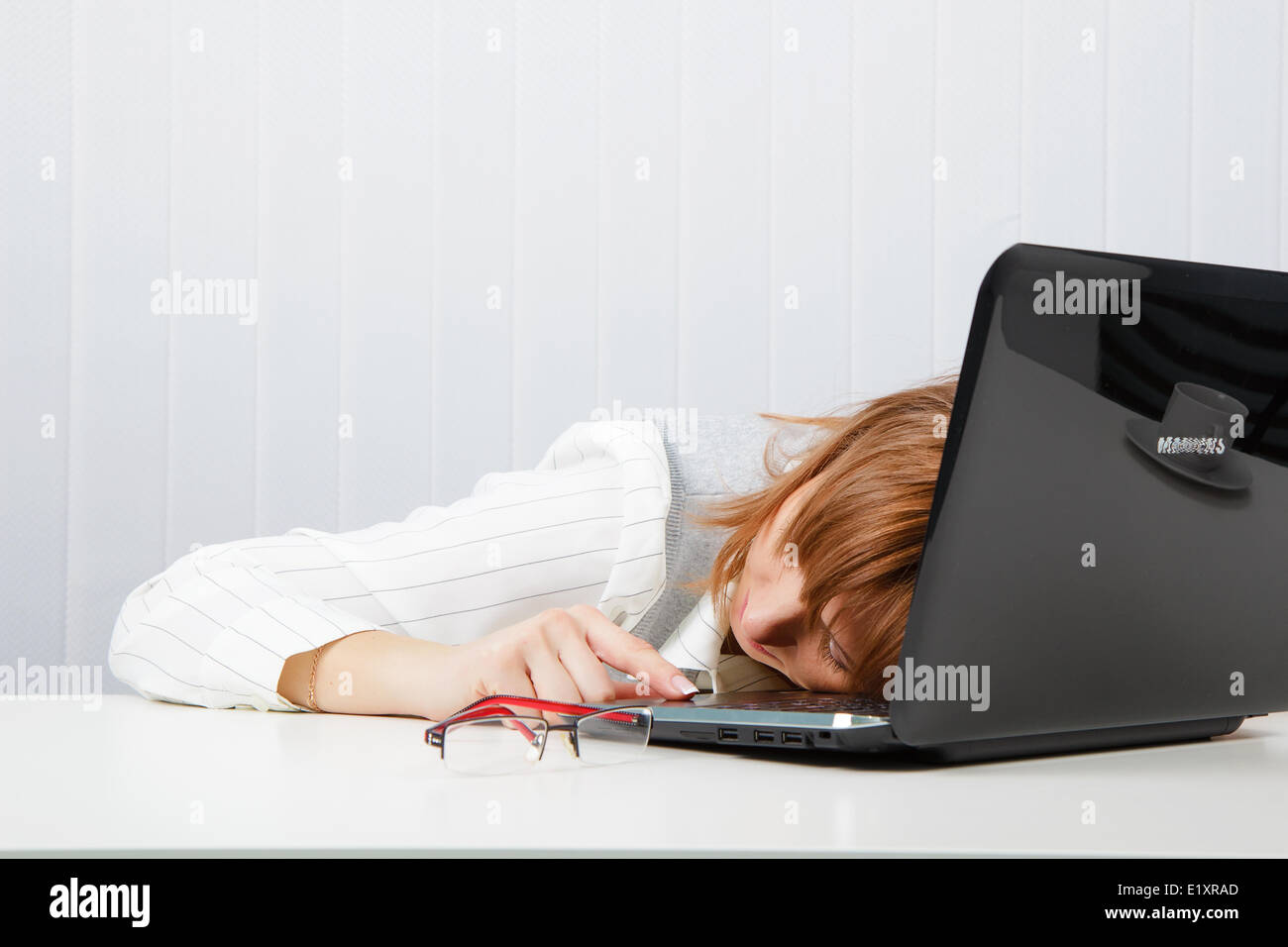 Girl asleep at a table hi-res stock photography and images - Alamy
