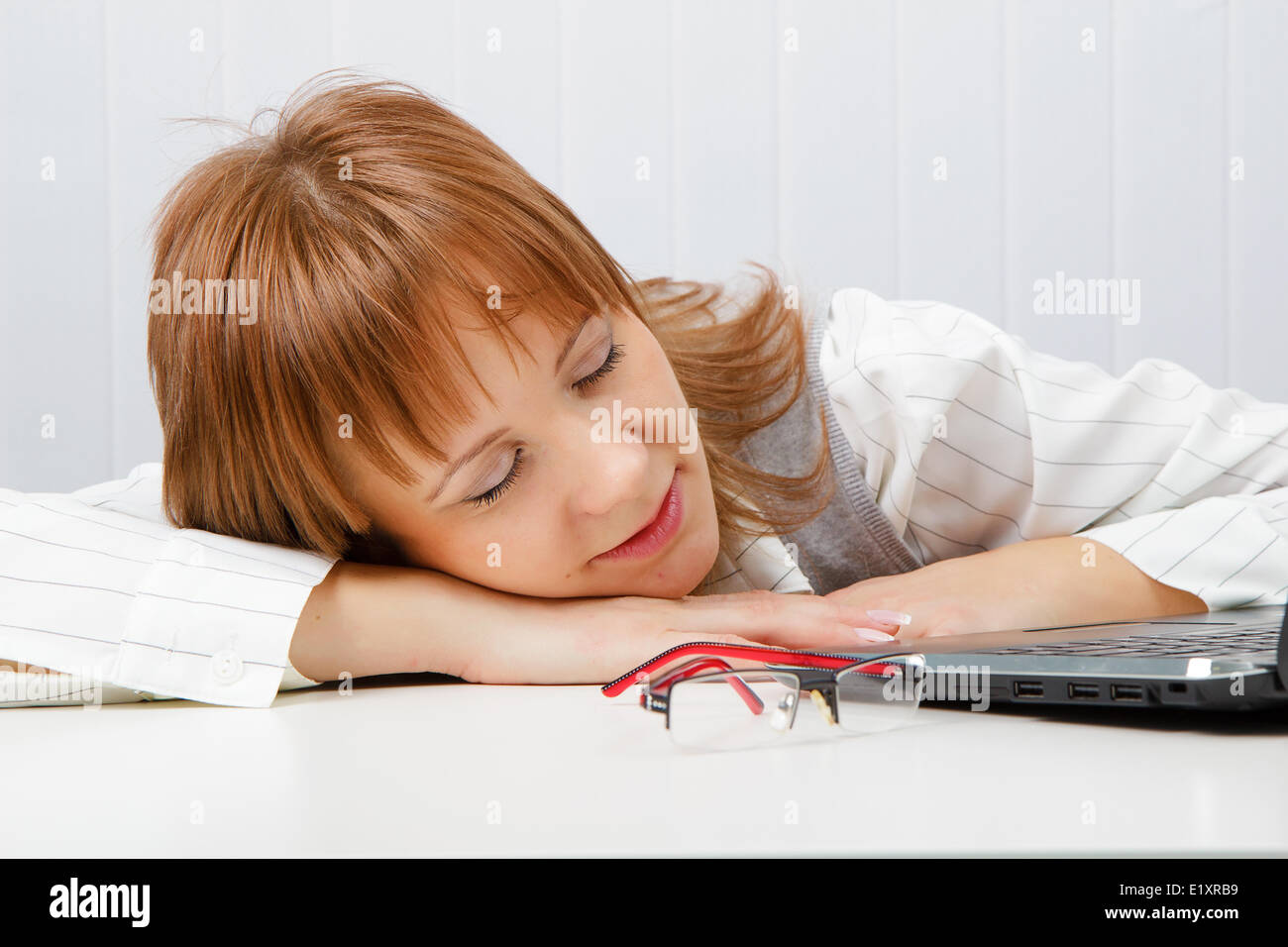 Girl asleep at a table hi-res stock photography and images - Alamy