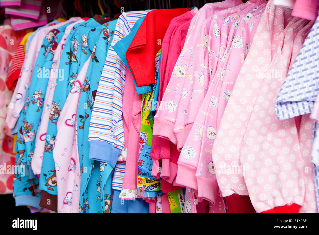 a lot of clothes on a hanger Stock Photo - Alamy