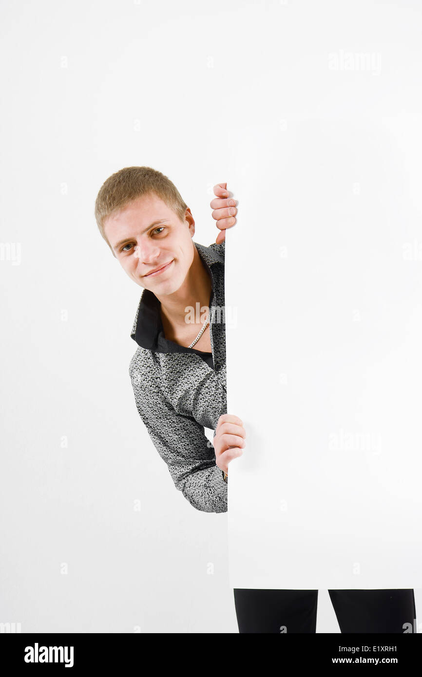 young man with a placard Stock Photo - Alamy