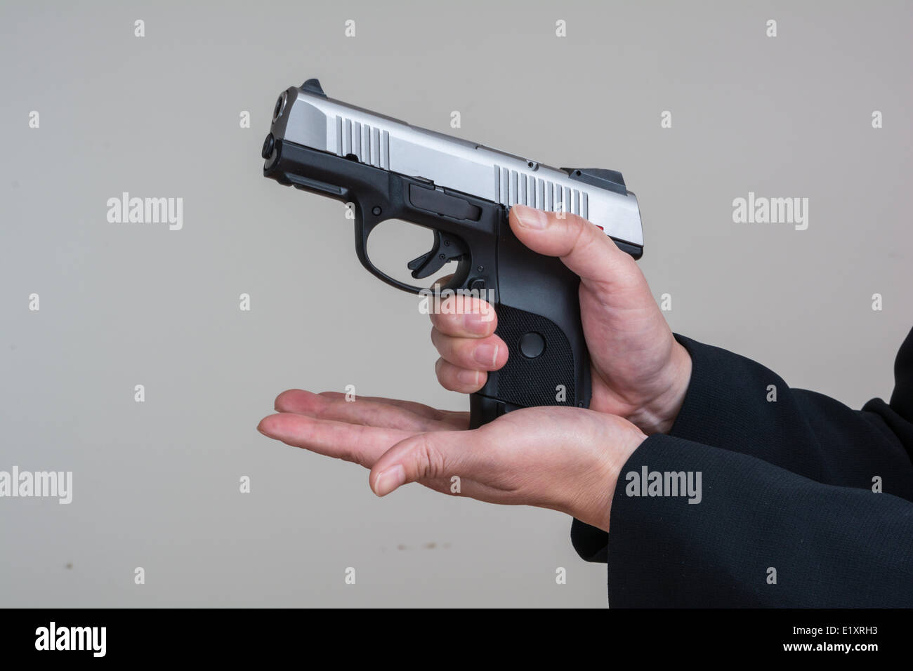 Woman dress gun hi-res stock photography and images - Alamy