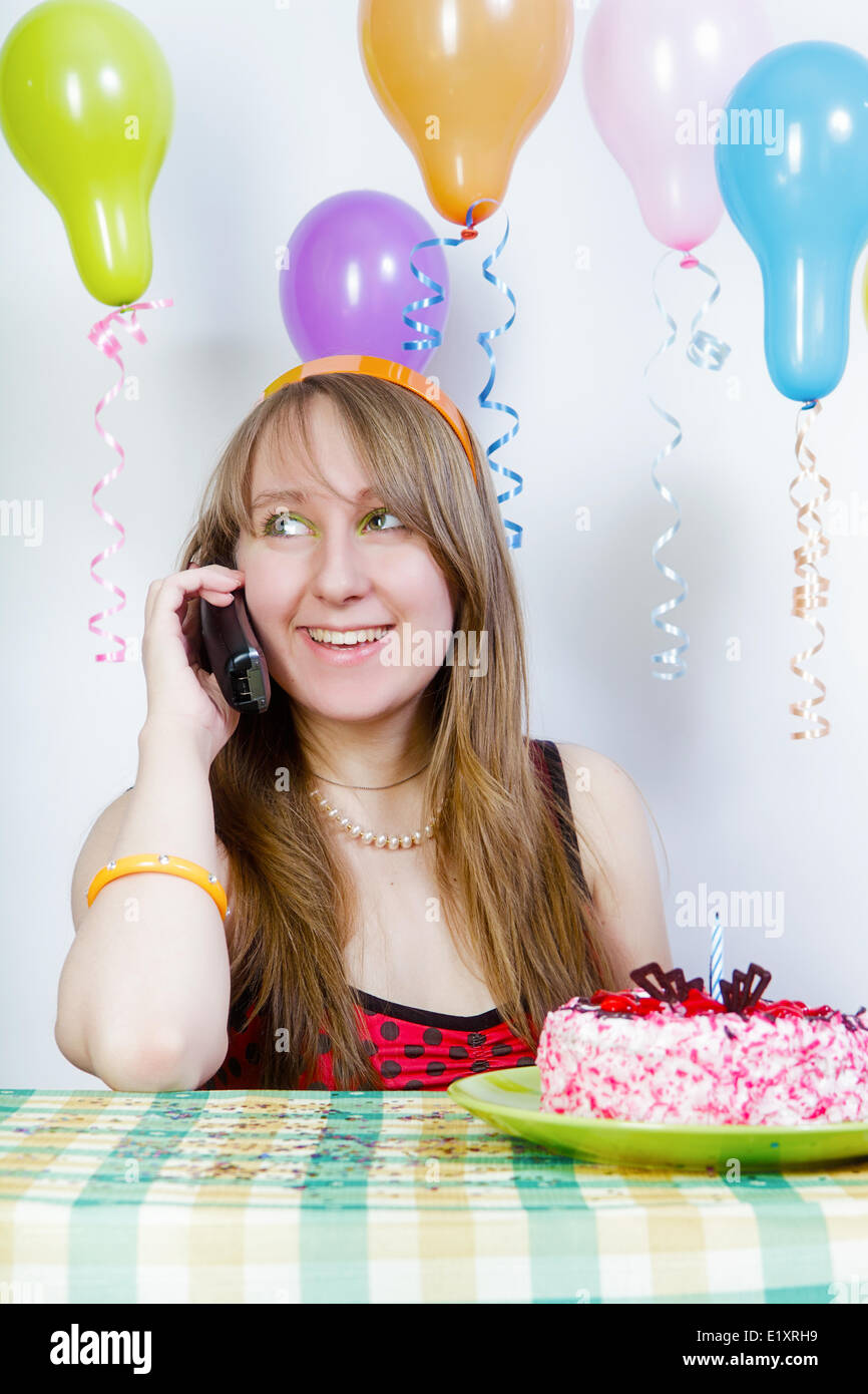 Birthday. Lucky girl talking on the phone Stock Photo - Alamy