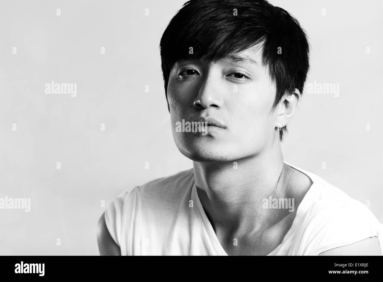 Young man looking tired Stock Photo - Alamy