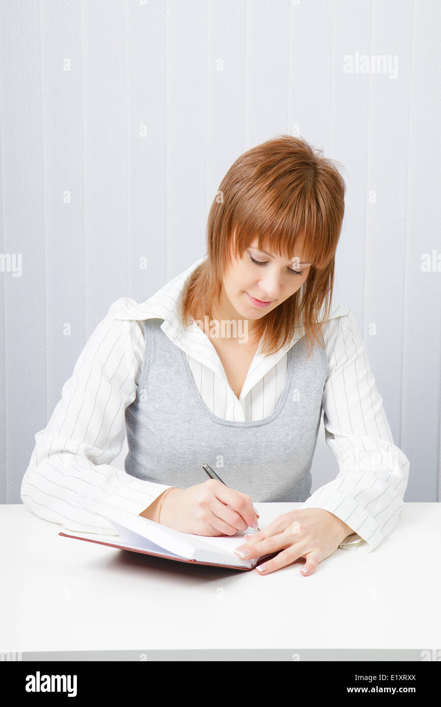 Girl looking for pen hi-res stock photography and images - Alamy