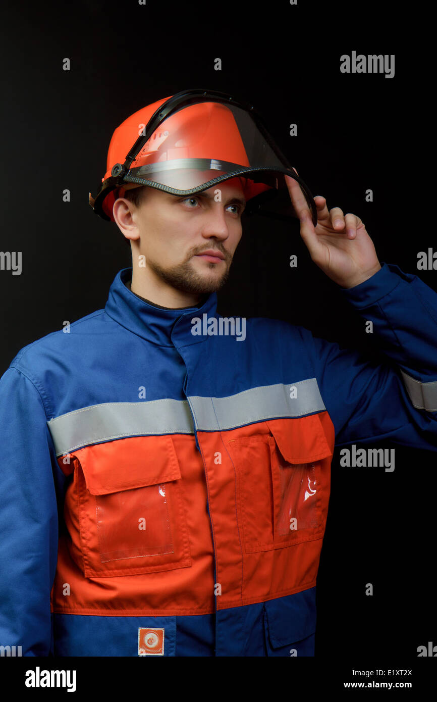 Workman in red helmet hi-res stock photography and images - Alamy