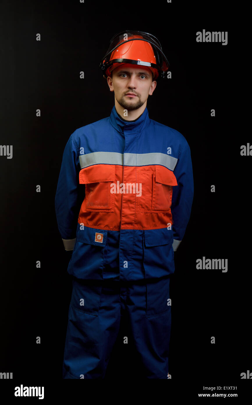 Builder worker in helmet hi-res stock photography and images - Alamy