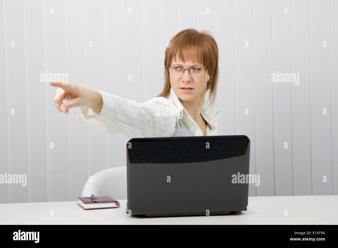 angry young woman chief Stock Photo - Alamy