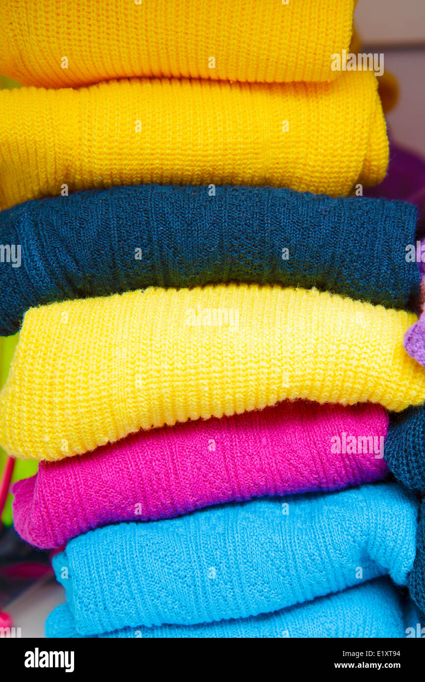 pile of bright colored tights for children Stock Photo - Alamy