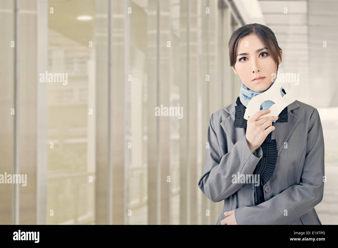 usiness woman hold a mask Stock Photo - Alamy