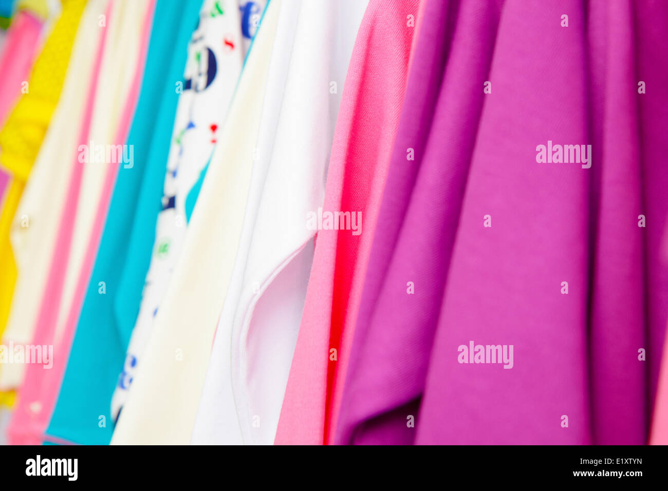 a lot of clothes on a hanger Stock Photo - Alamy