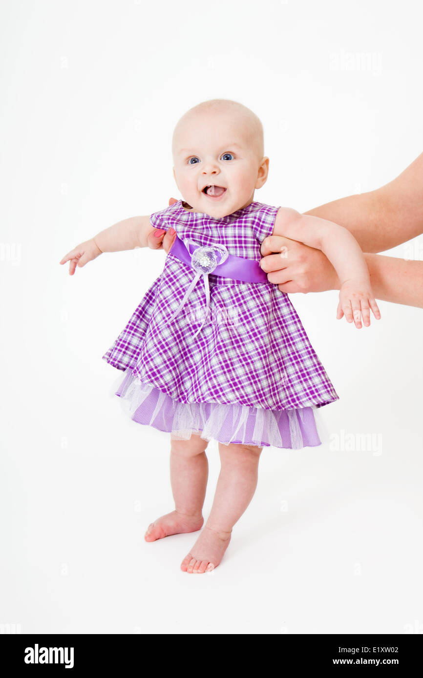 baby in a dress Stock Photo - Alamy