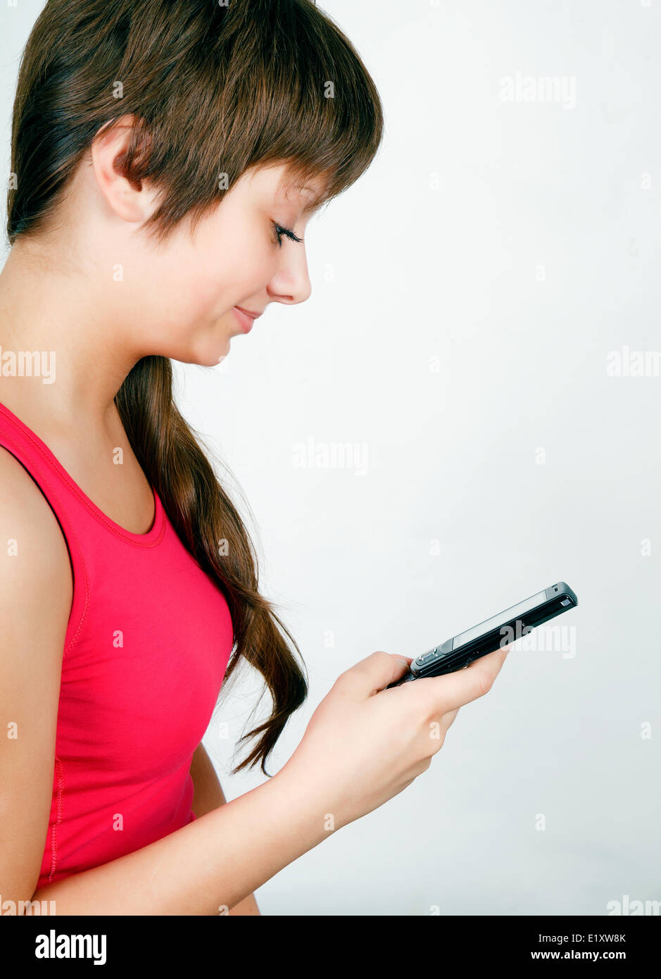 Mobile phone teen hi-res stock photography and images - Alamy