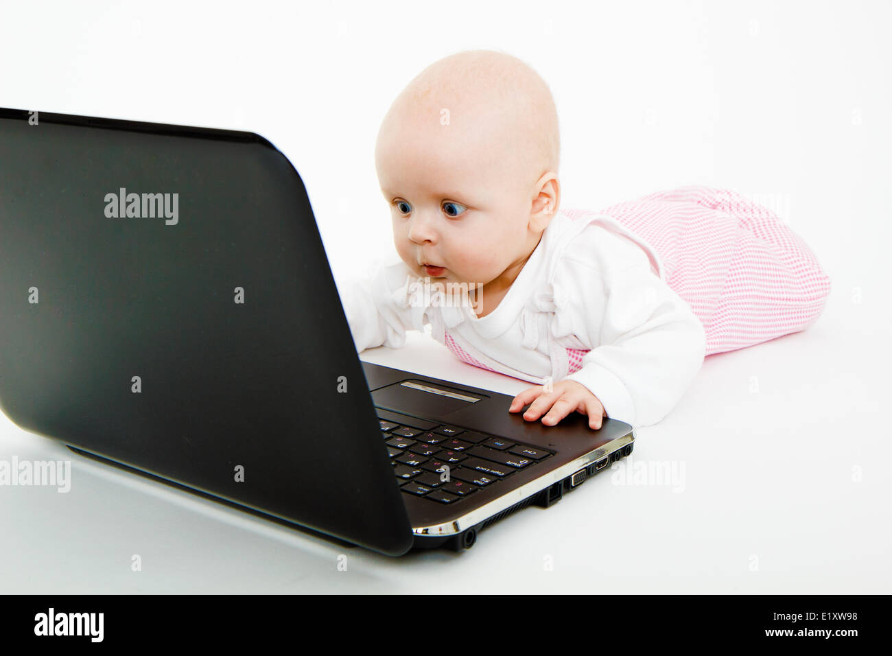 little kid with a laptop Stock Photo - Alamy