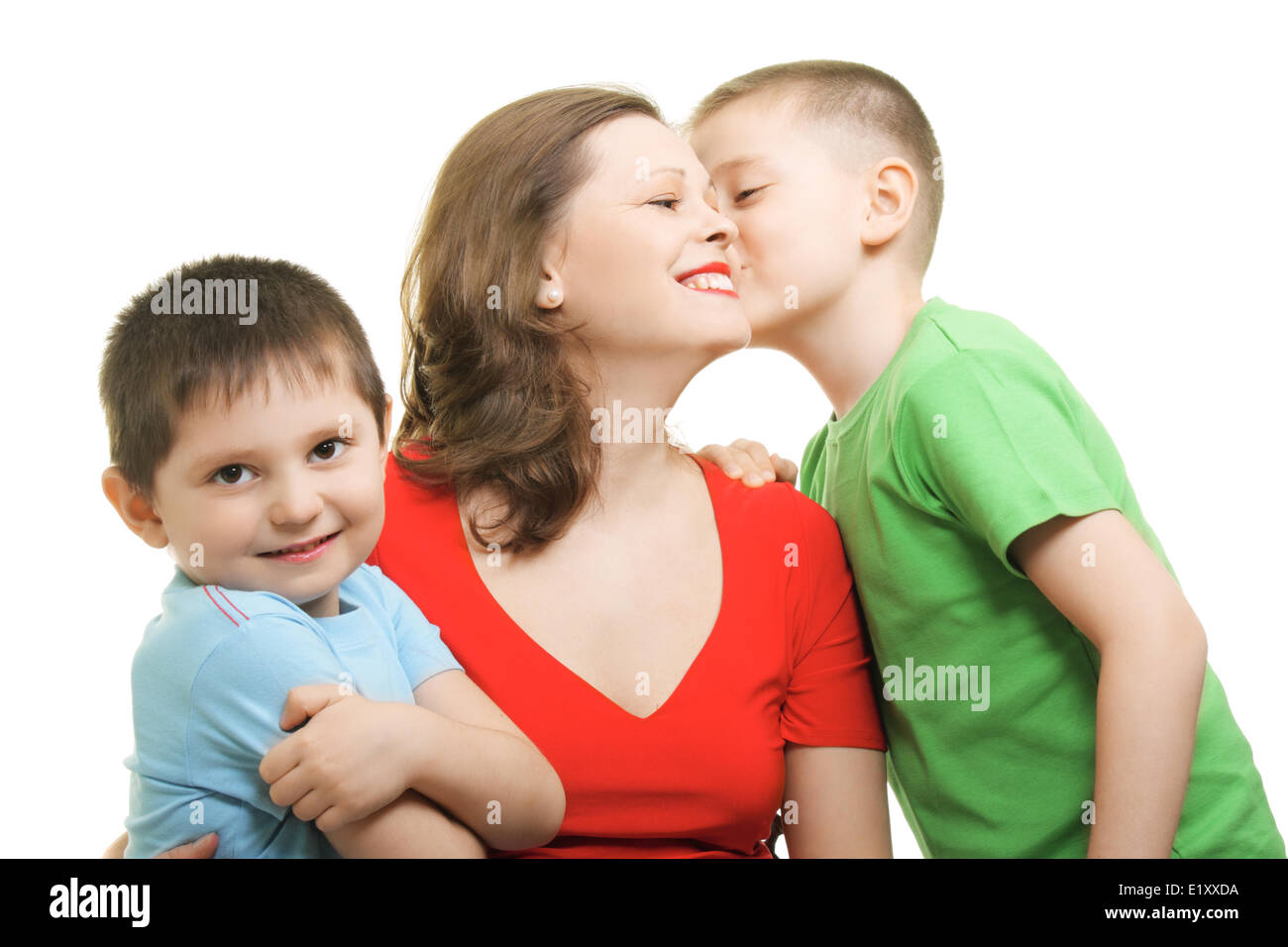 Boy kisses on mommys cheeck Stock Photo - Alamy