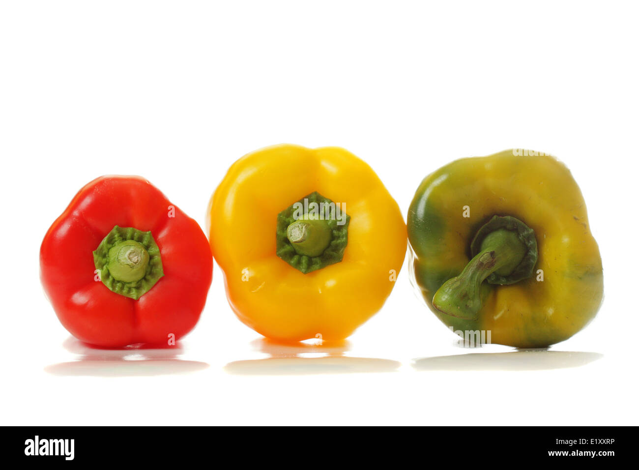 Three paprikas of different colors Stock Photo - Alamy