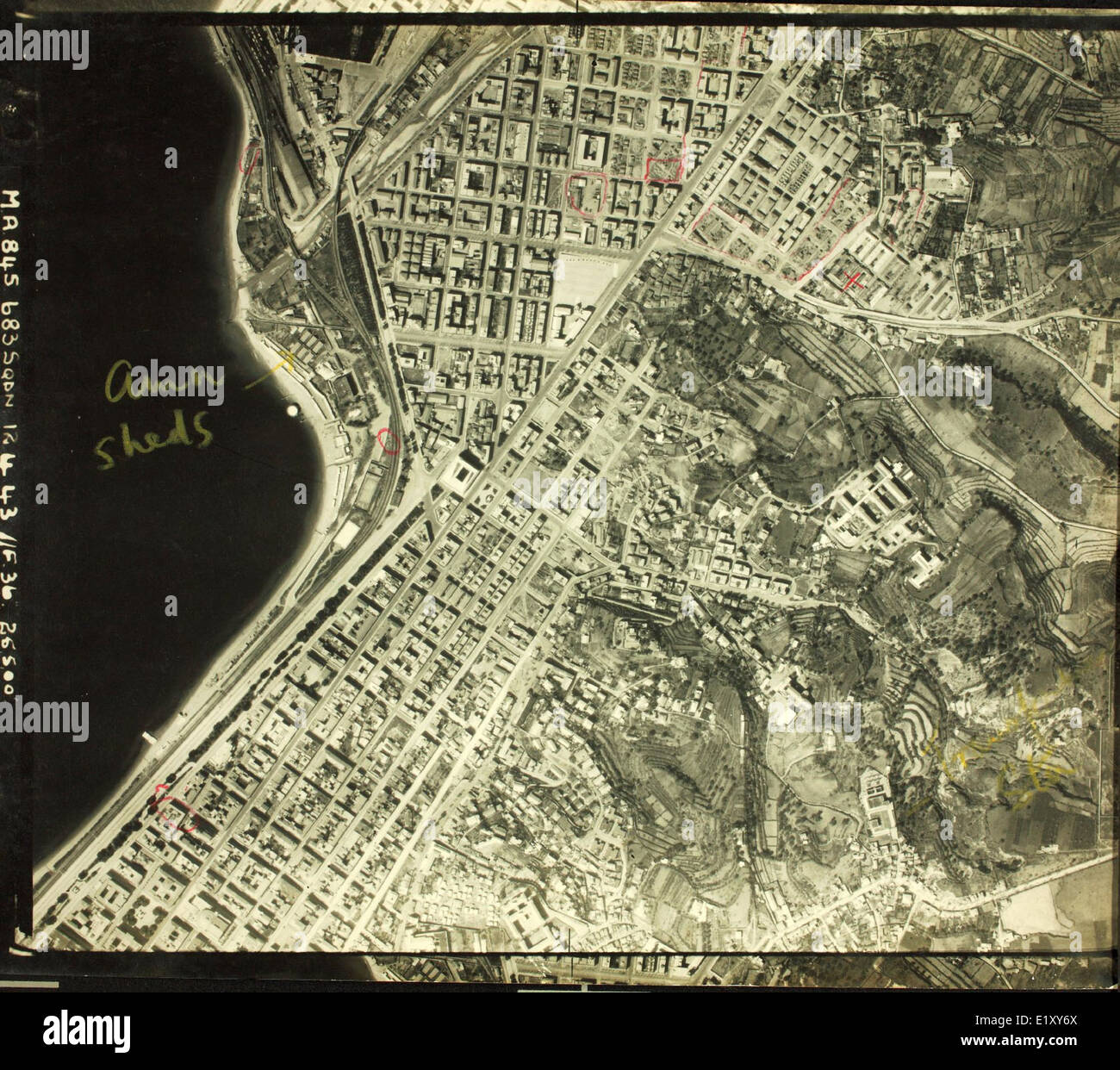This aerial reconnaissance photo from World War II captures Messina ...