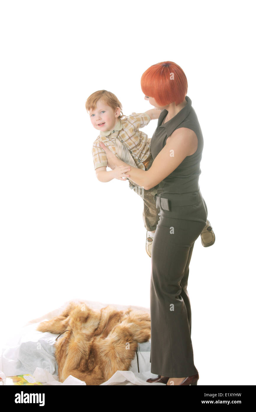 Happy boy in mummy hands Stock Photo - Alamy