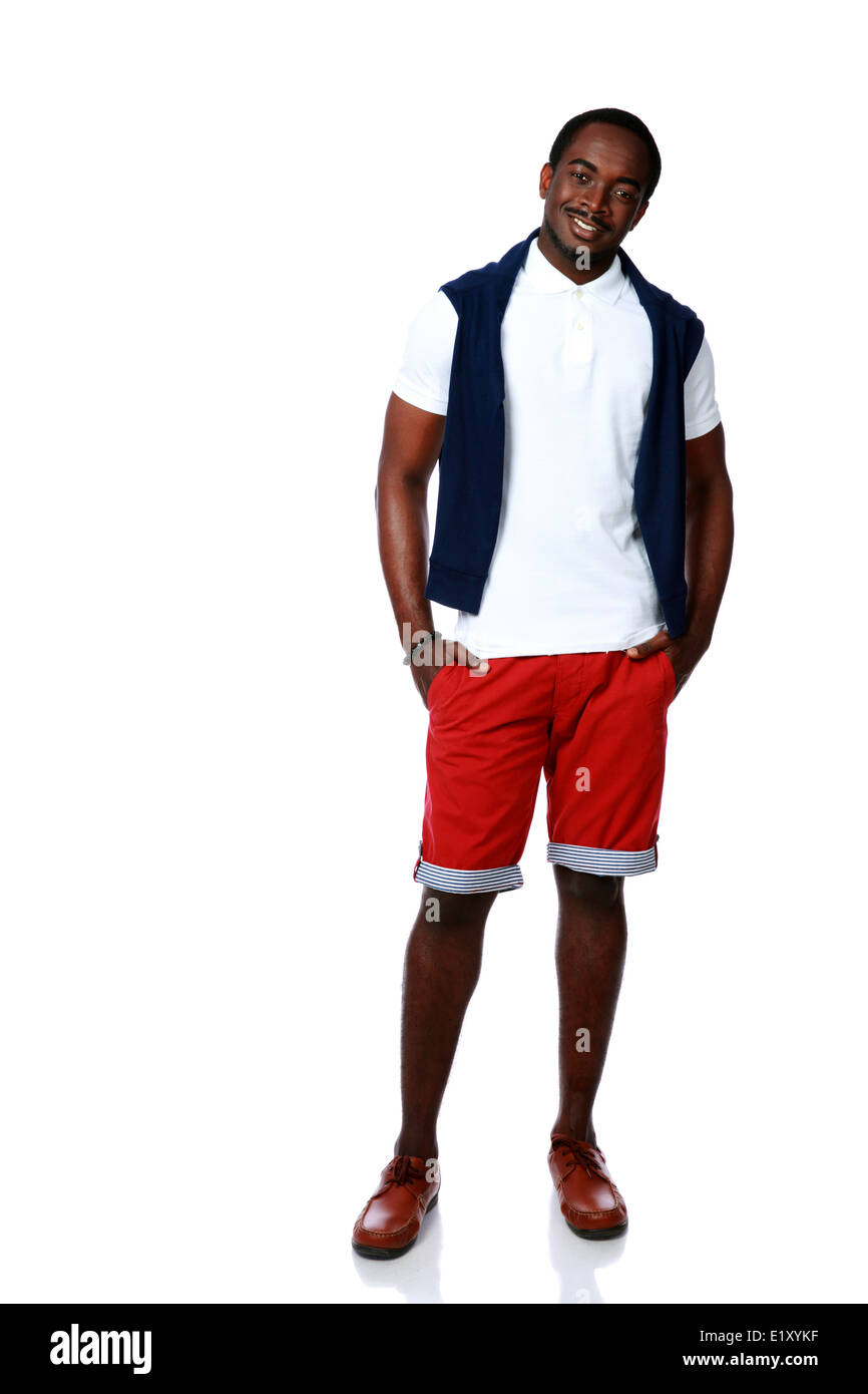 Full length portrait of a smiling african man over white background ...