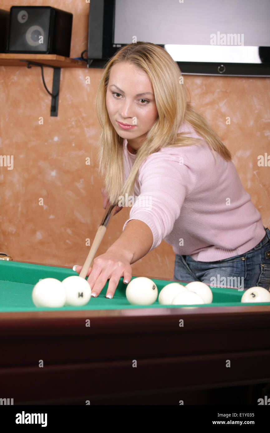 Girl at billiards table Stock Photo - Alamy