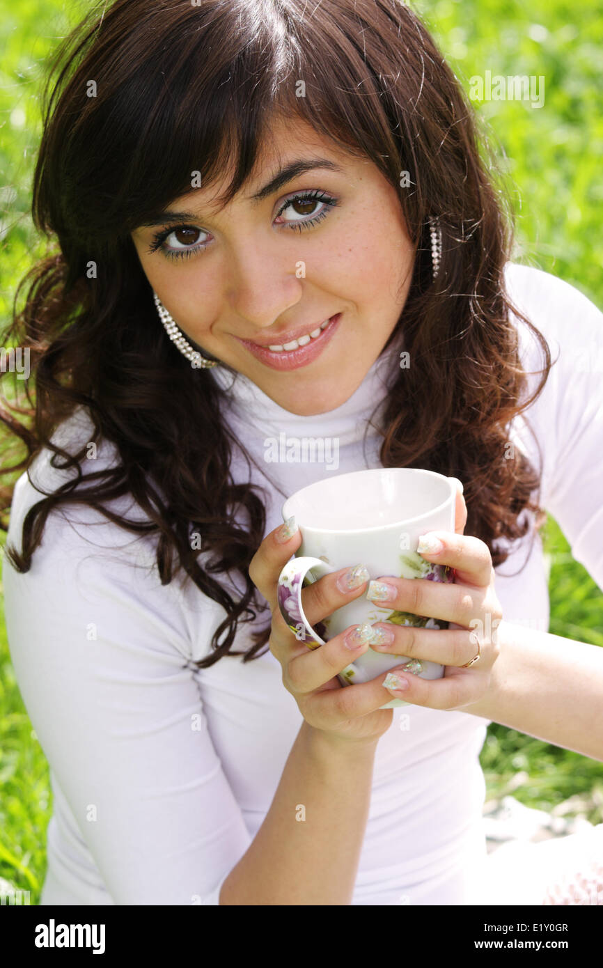 Pretty girl with cup Stock Photo - Alamy