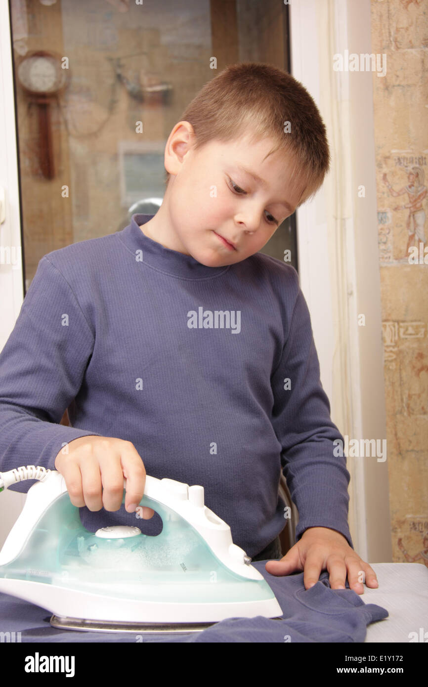 Ironing boy hi-res stock photography and images - Alamy
