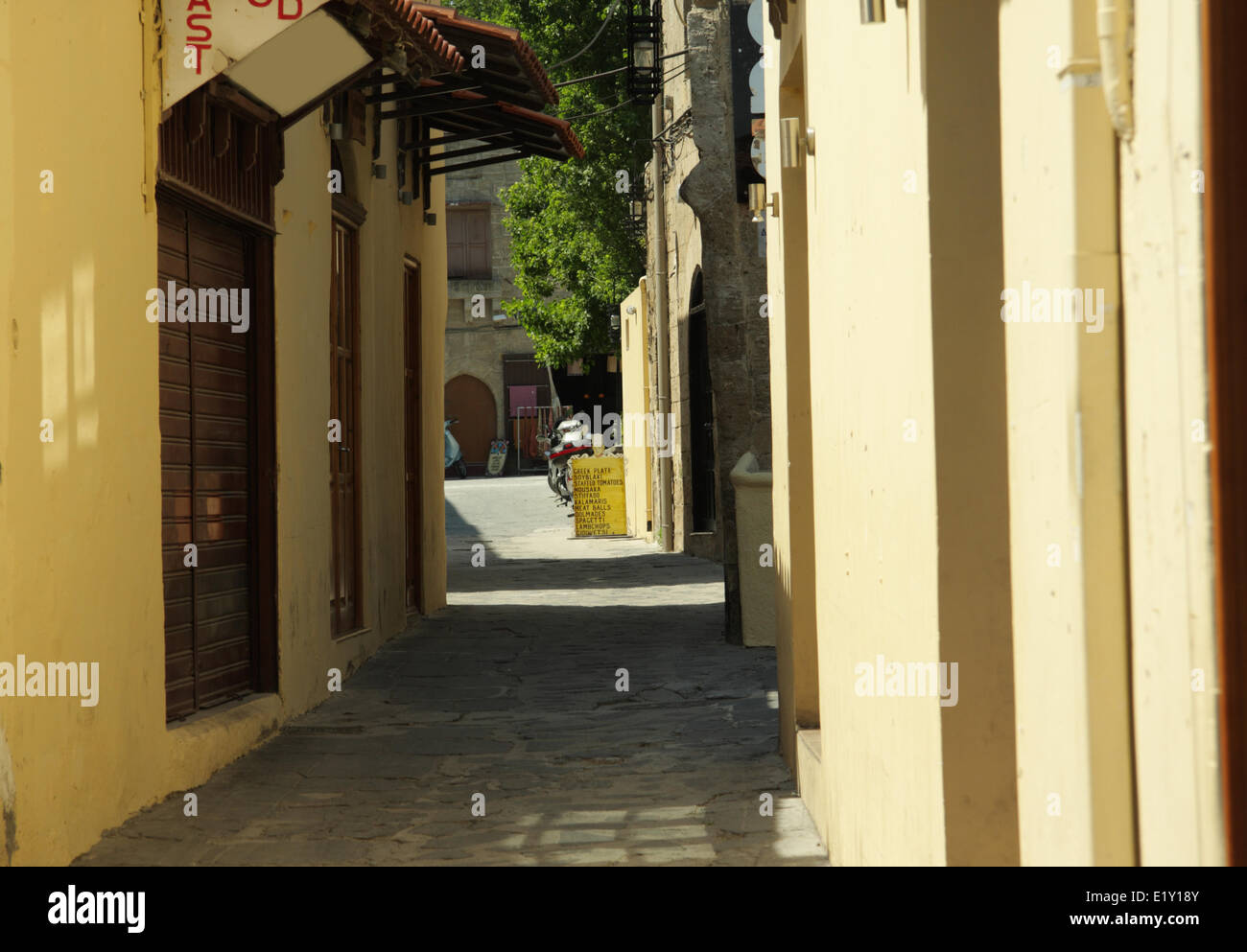 Narrow street in Rhodes Stock Photo - Alamy