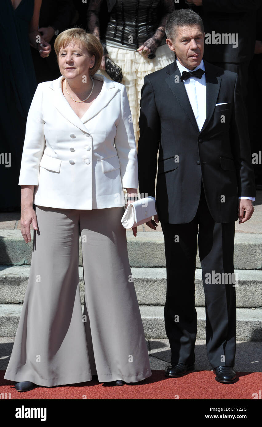 German chancellor Angela Merkel (CDU) and her husband Joachim Sauer ...