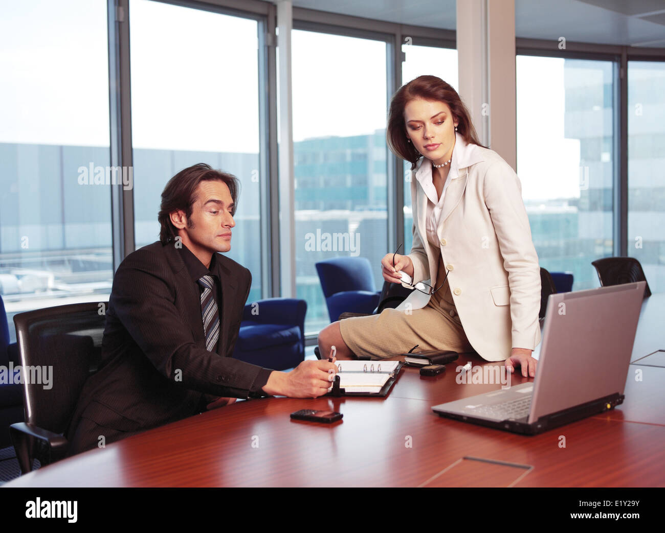 Business people in an office environment Stock Photo - Alamy