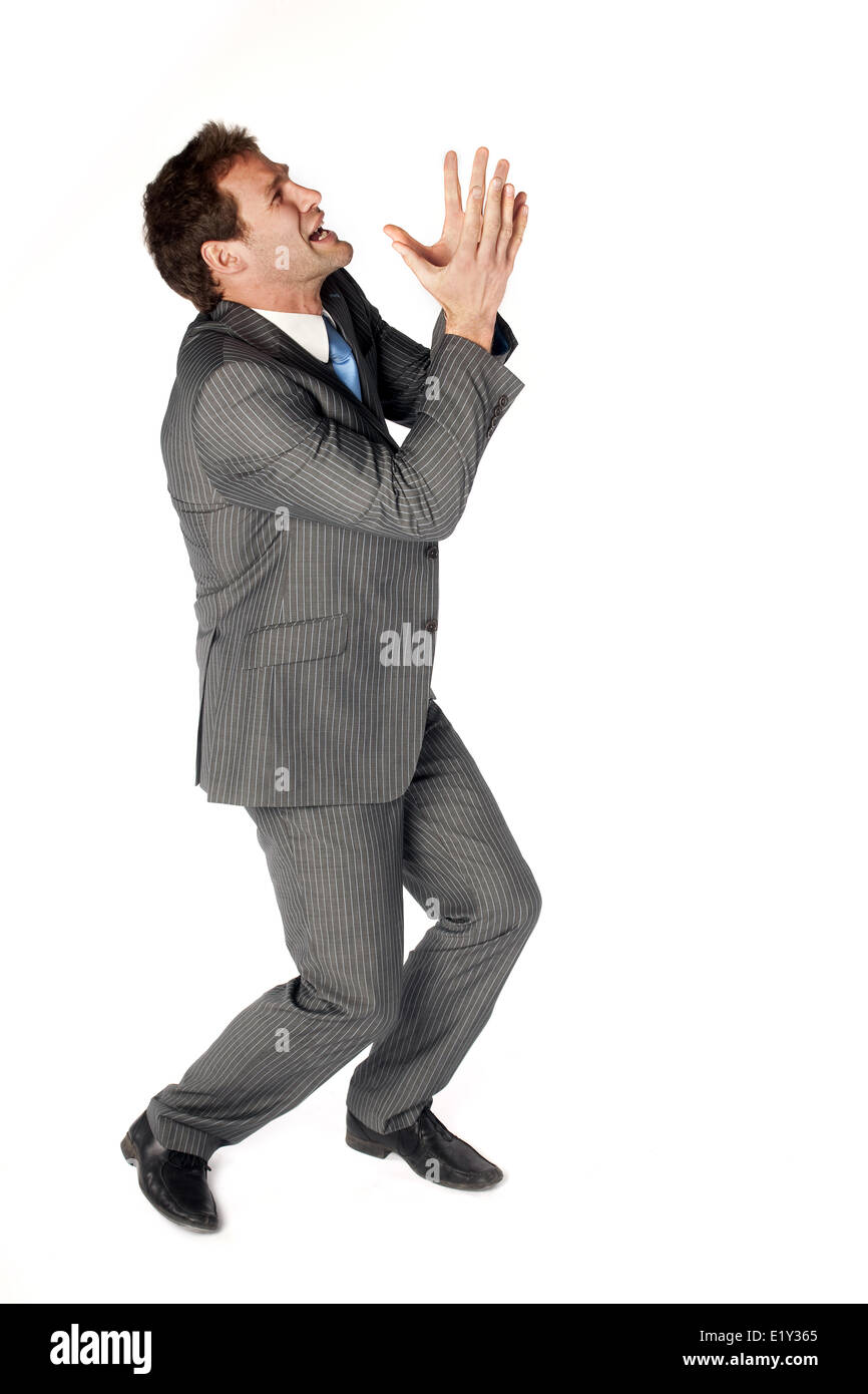 A stressed business man pleaing Stock Photo - Alamy