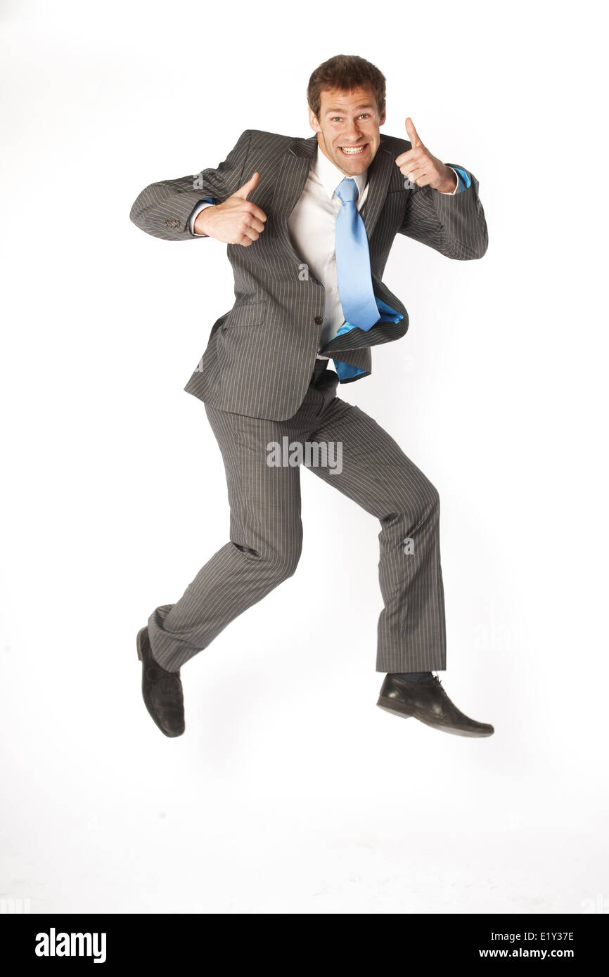 Excited businessman jumping office hi-res stock photography and images ...