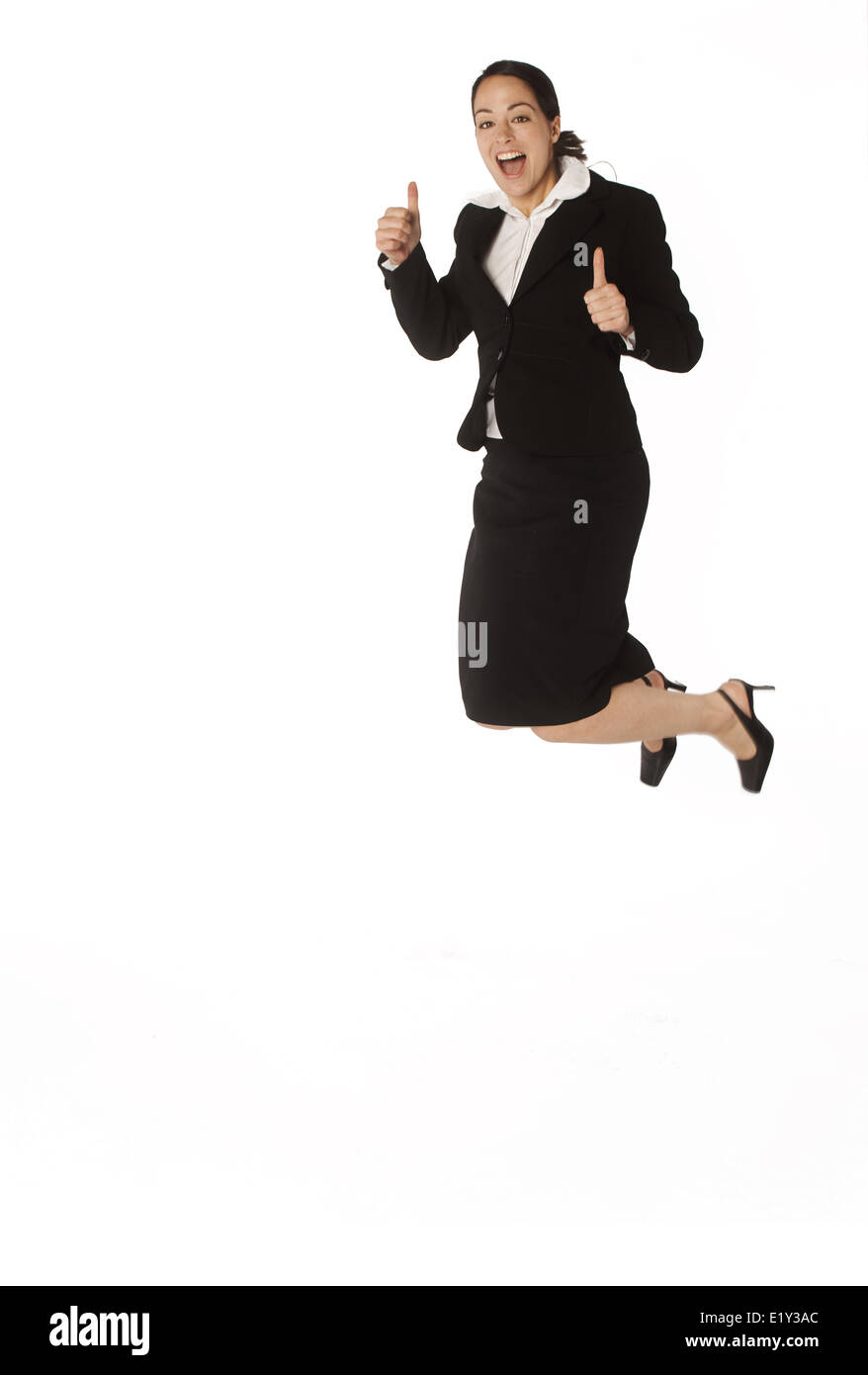 woman in black business suit jumps for joy Stock Photo - Alamy
