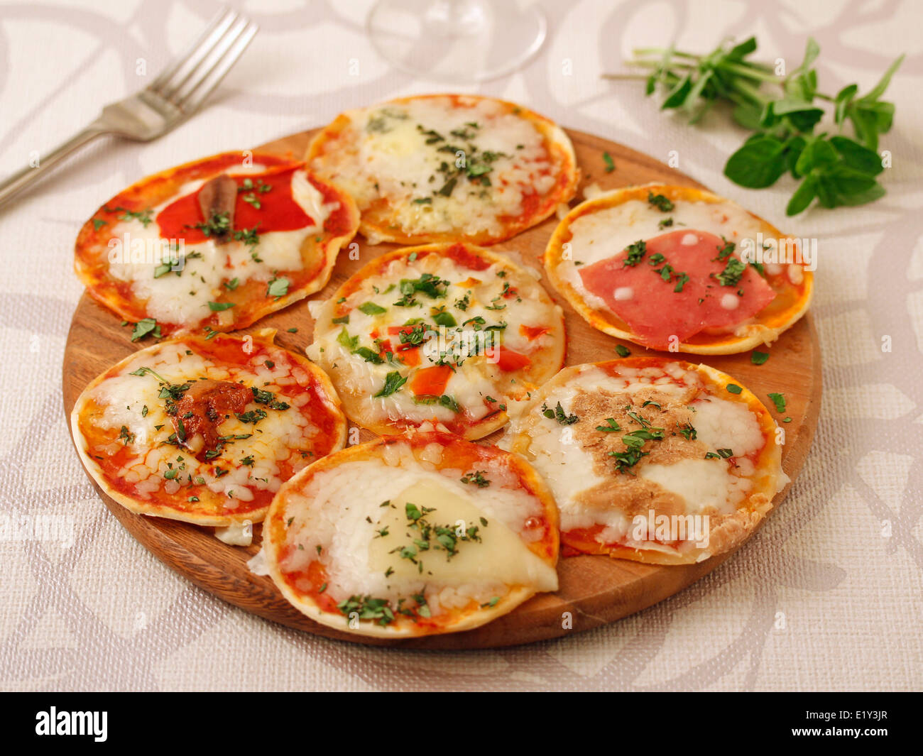 Little pizzas hi-res stock photography and images - Alamy