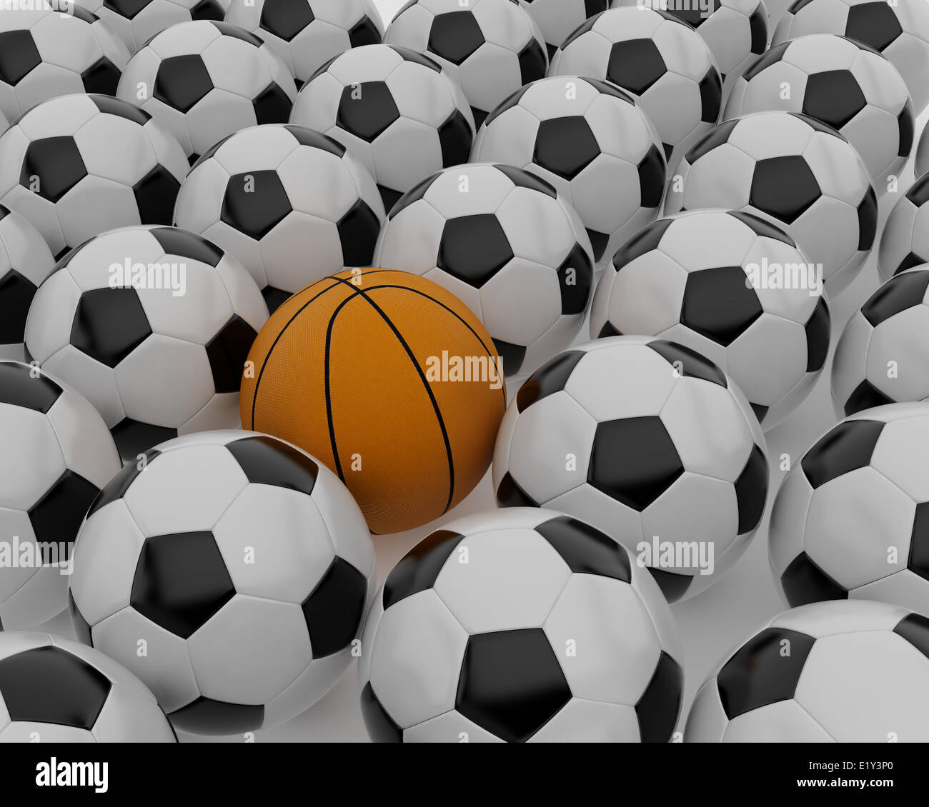 Basketball and football balls Stock Photo - Alamy