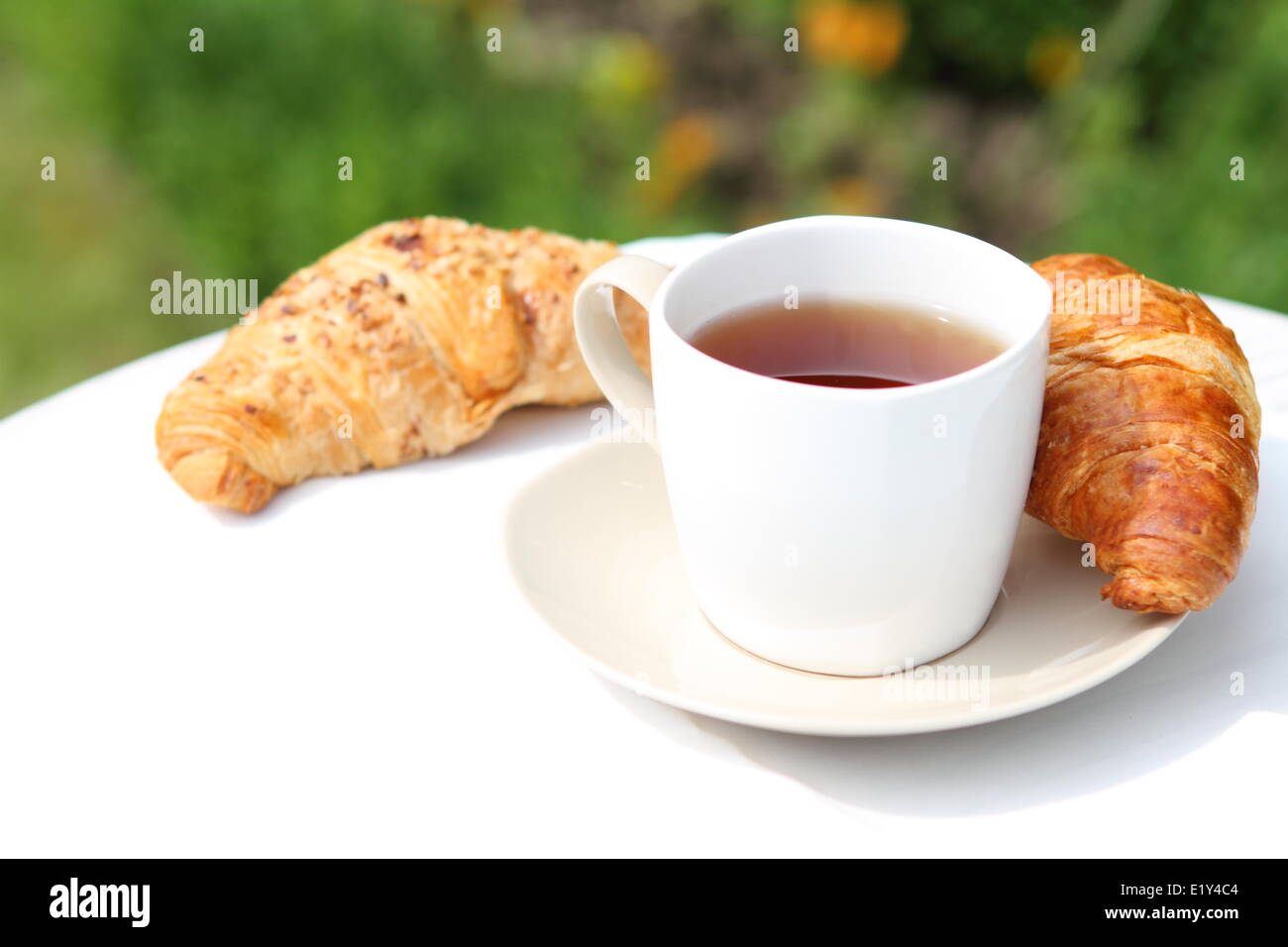 Tea and croissants Stock Photo - Alamy