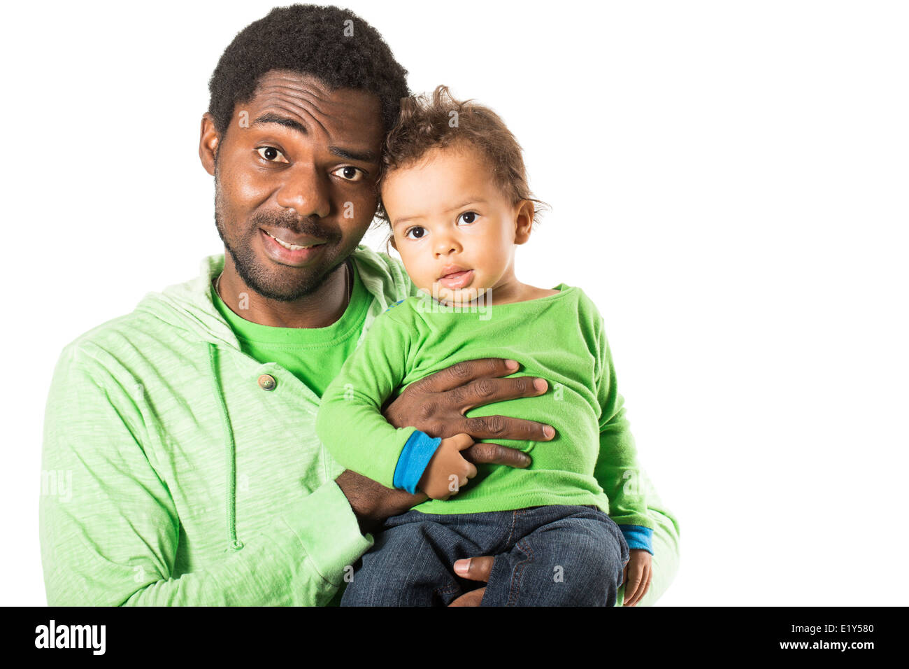 Happy black father and child boy cuddling on isolated white background ...