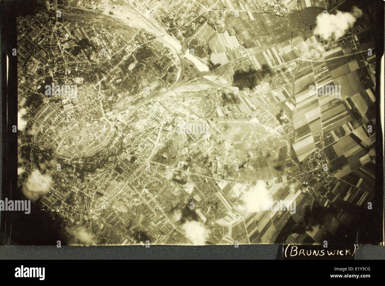 This World War II-era aerial reconnaissance photo captures a military ...