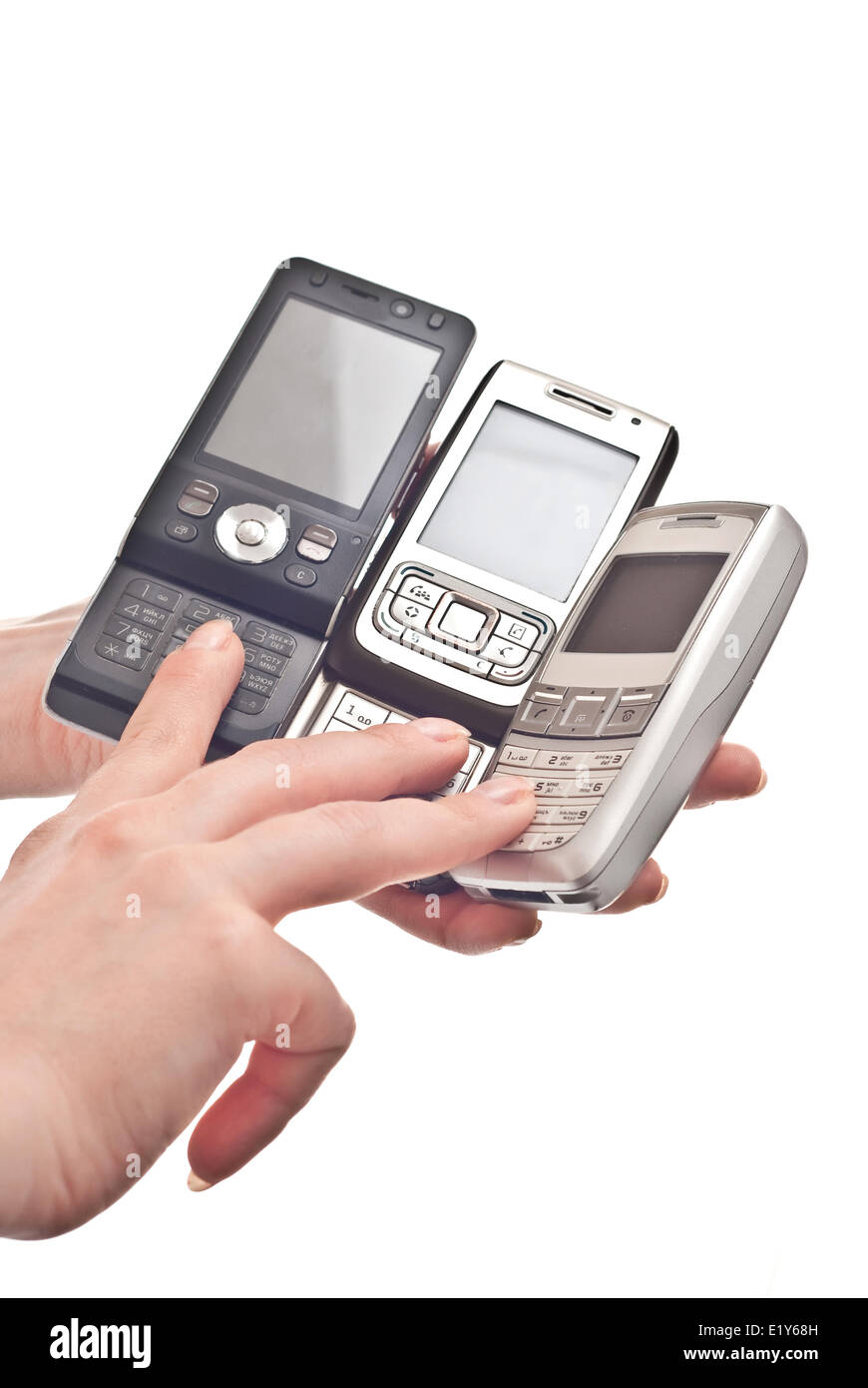 Three mobile phones Stock Photo - Alamy