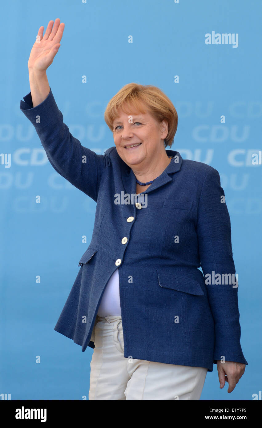 German chancellor Angela Merkel waves during an election campaign event ...