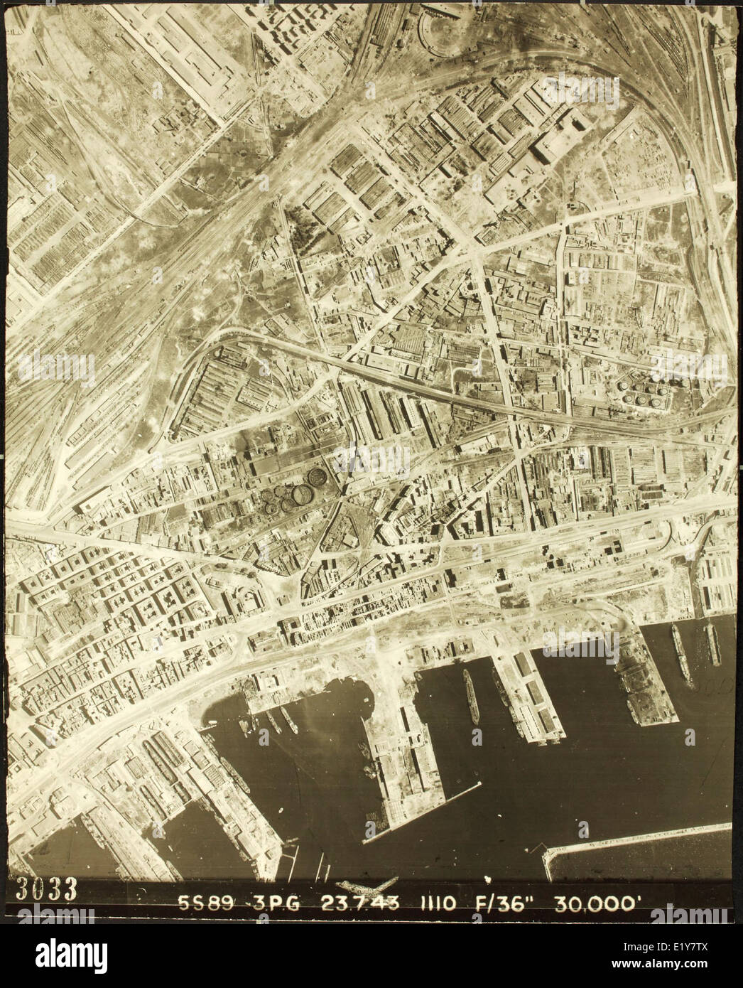 This aerial reconnaissance photograph shows Naples, Italy, during the ...