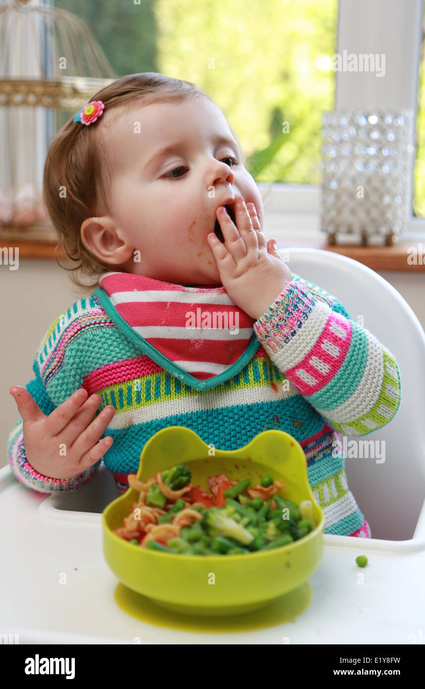 Toddler eating a healthy lunch Stock Photo - Alamy