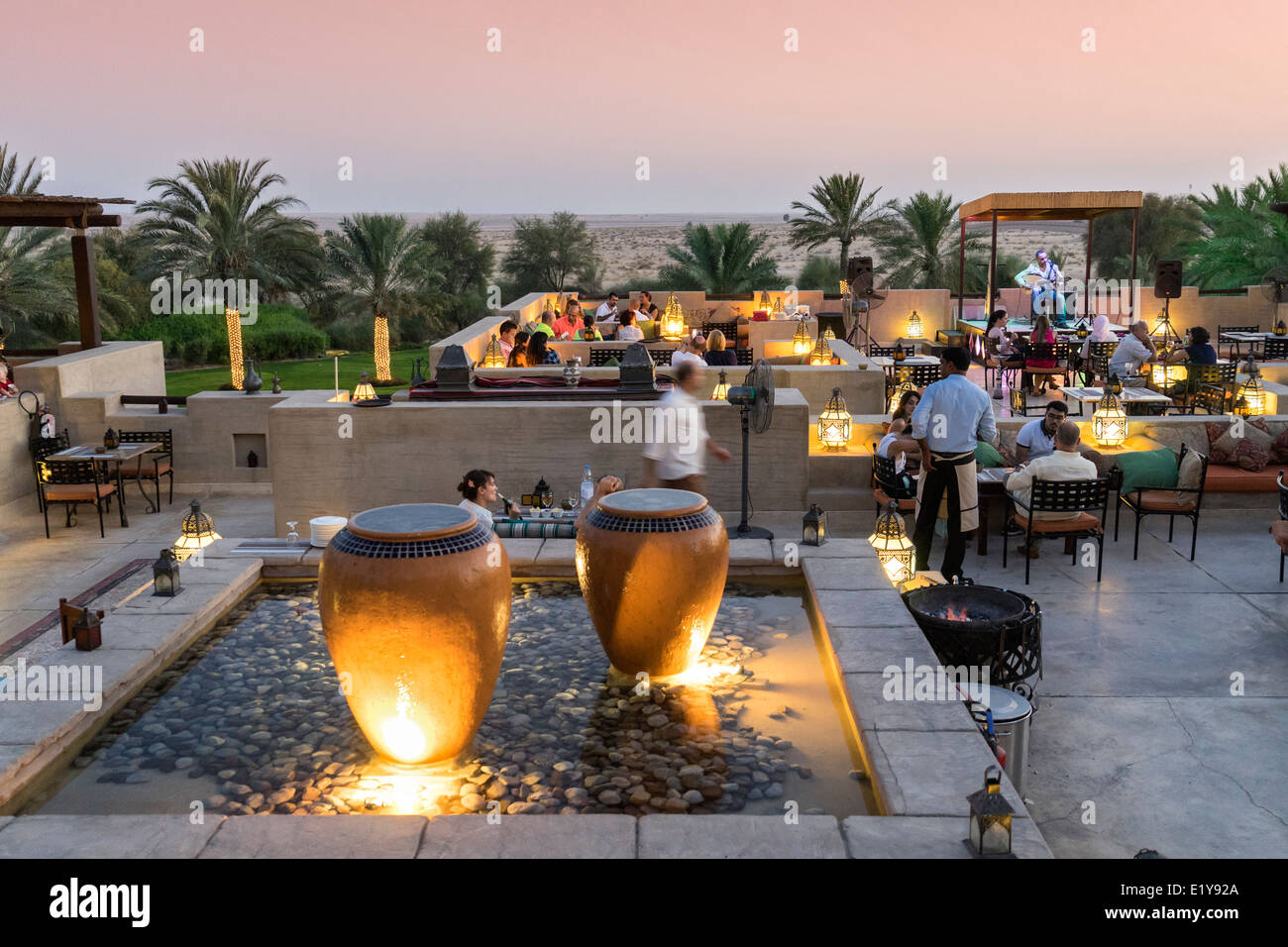 Dusk at rooftop bar at Bab al Shams desert hotel and resort in Dubai ...