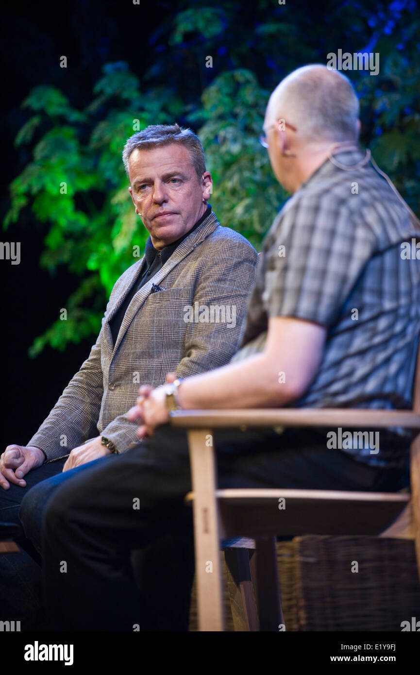 Suggs talking about his early life and years as a musician on stage at ...