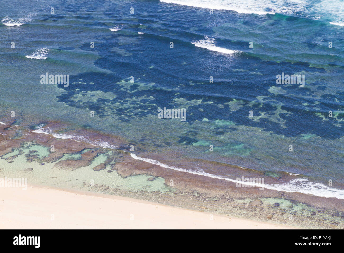 Ocean and sandy beach on a sunny day Stock Photo - Alamy