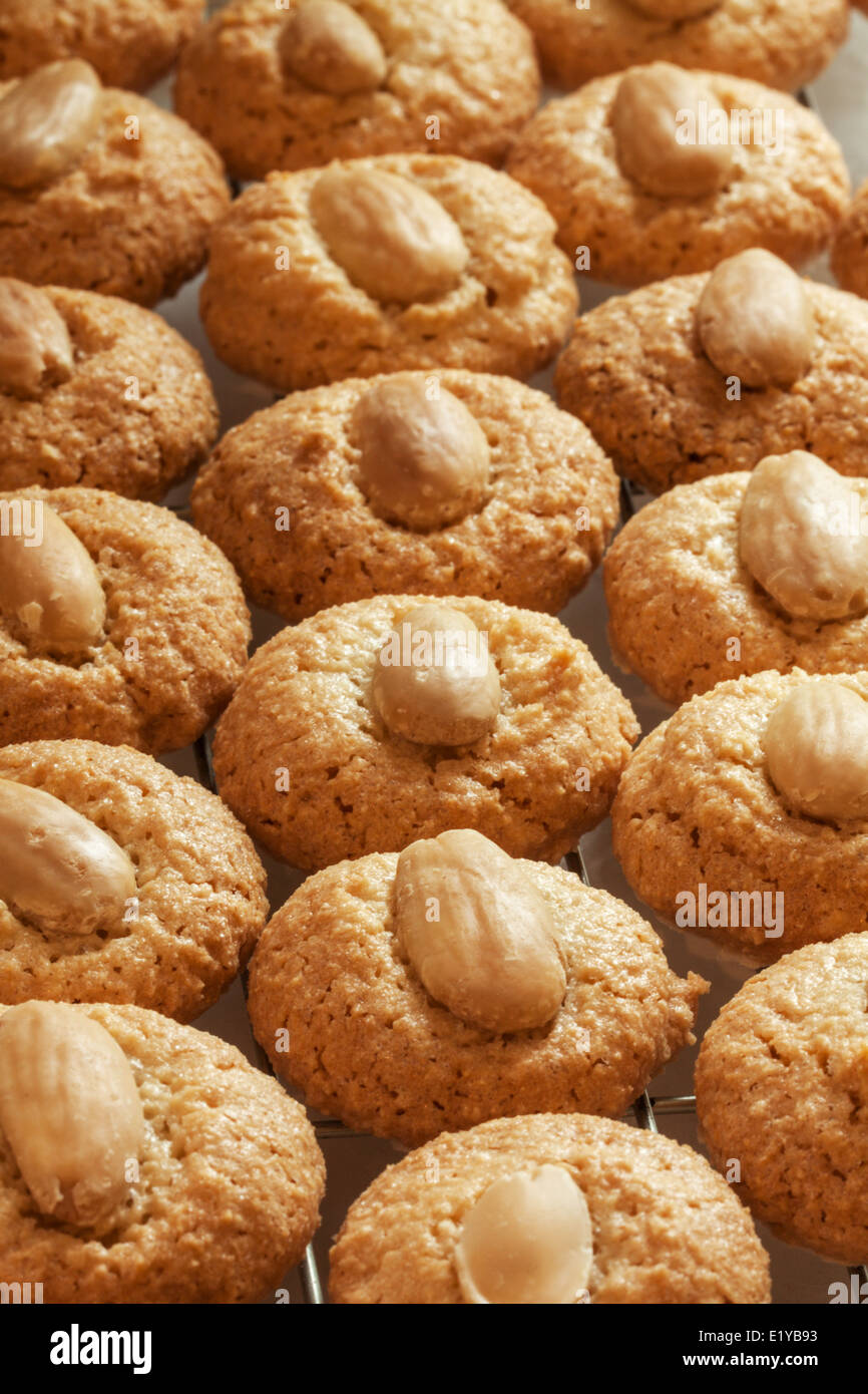 Coconut macaroon biscuits cooling after baking Stock Photo - Alamy