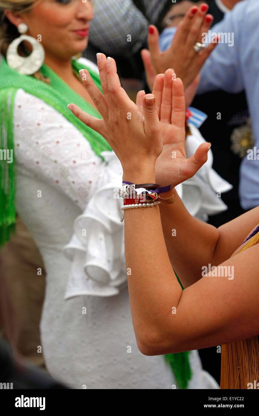 Spanish women wearing gypsy flamenco costume and dancing flamenco style ...