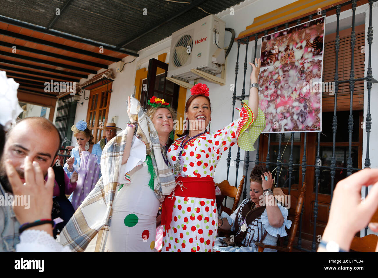 Woman dancing Andalusian style at the Rocio Romeria Catholic festival ...