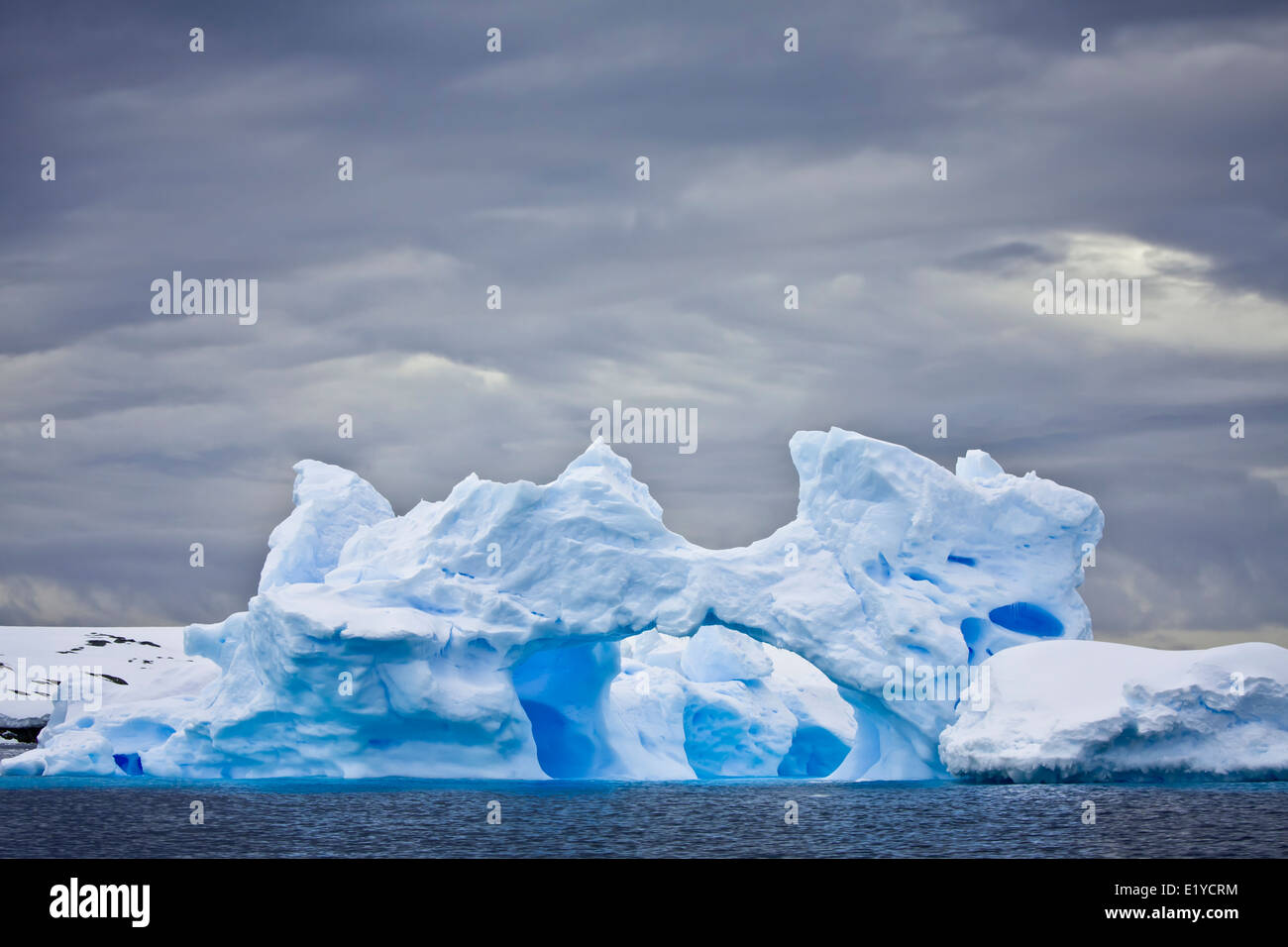 Antarctic iceberg in the snow. Beautiful winter background Stock Photo ...